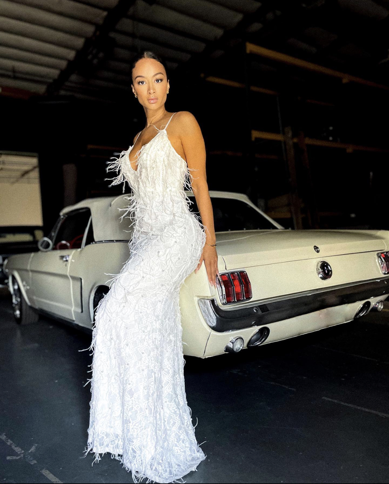 Draya Michele Poses in White Feather Embellished Dress by Fashion Nova ...