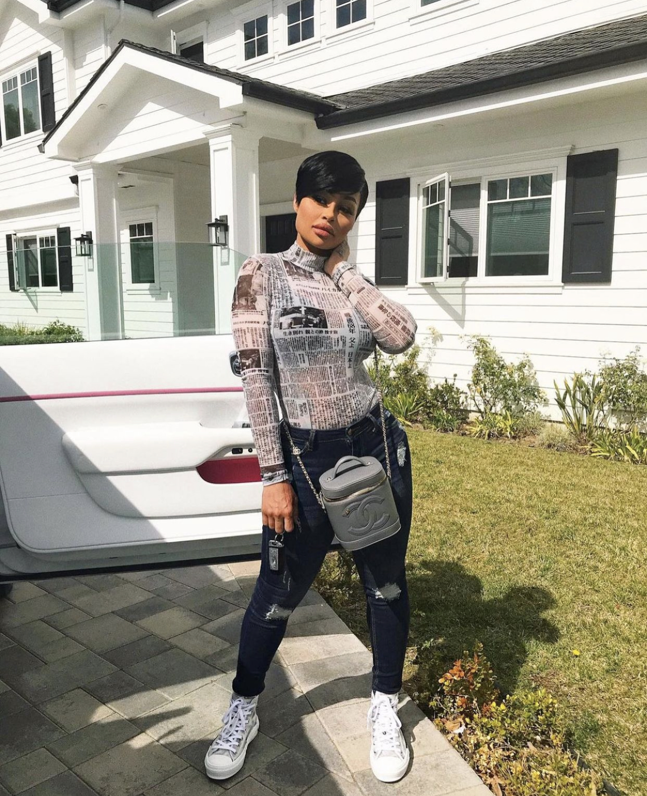 Blac Chyna Keeps It Chic in Fashion Nova Newspaper Print Bodysuit ...