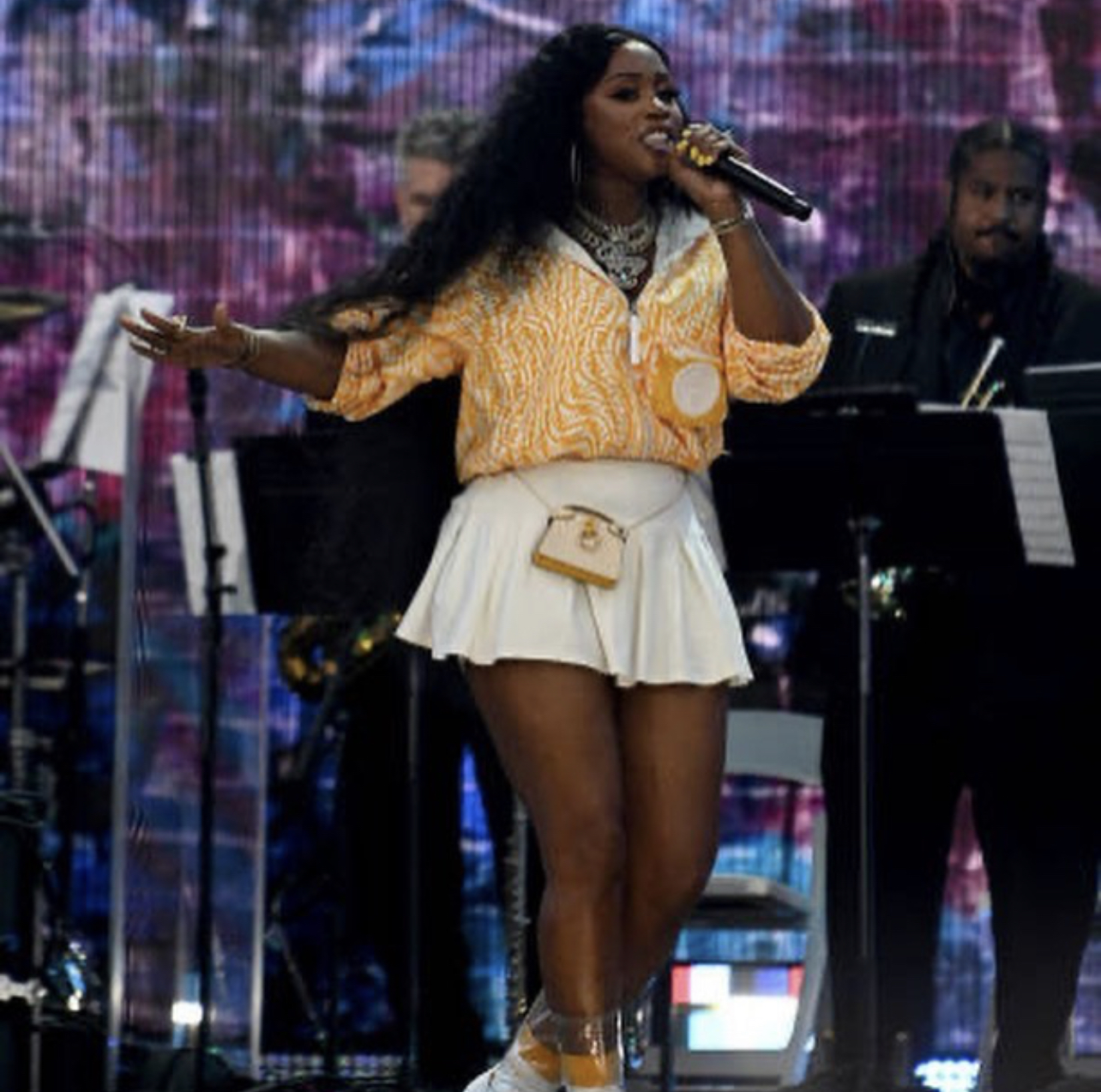 Remy Ma Performs at ‘We Love NYC’ Concert Wearing Fendi Yellow and ...