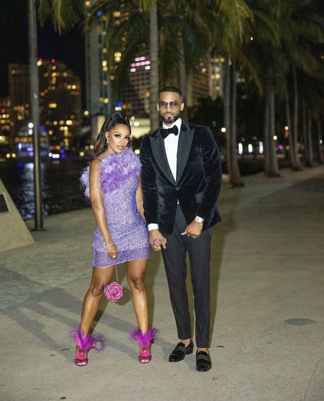 Monique Rodriguez Wears Bronx and Banco Purple Feathered Sequin Dress ...