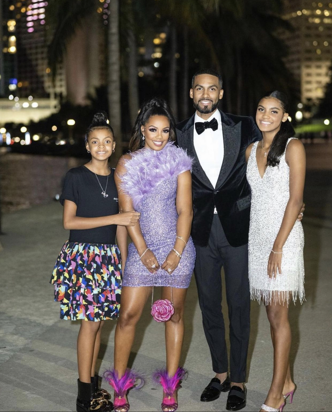 Monique Rodriguez Wears Bronx and Banco Purple Feathered Sequin Dress ...