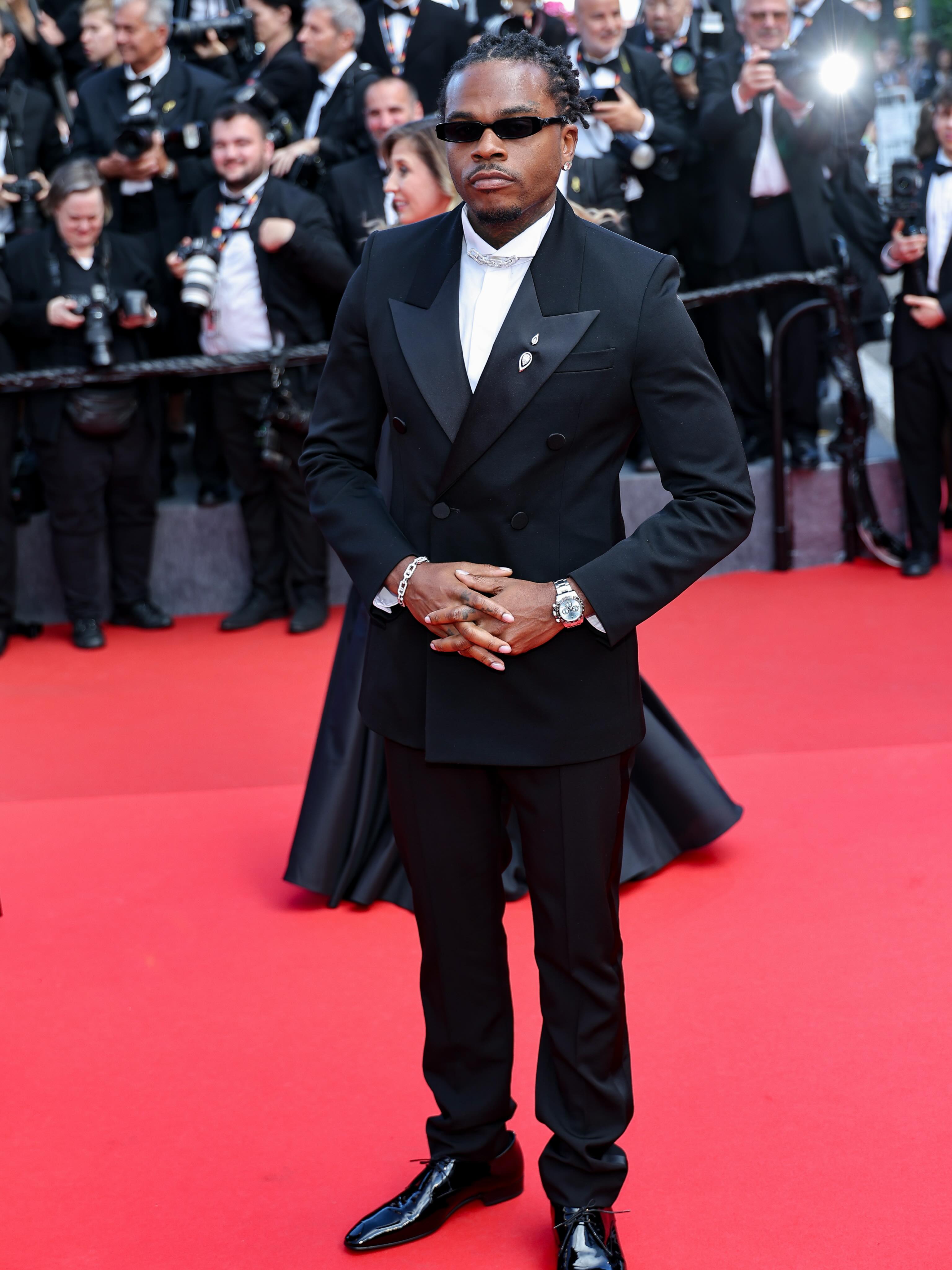 Gunna Flexes in Cannes with Girlfriend Brixana in YSL and more ...
