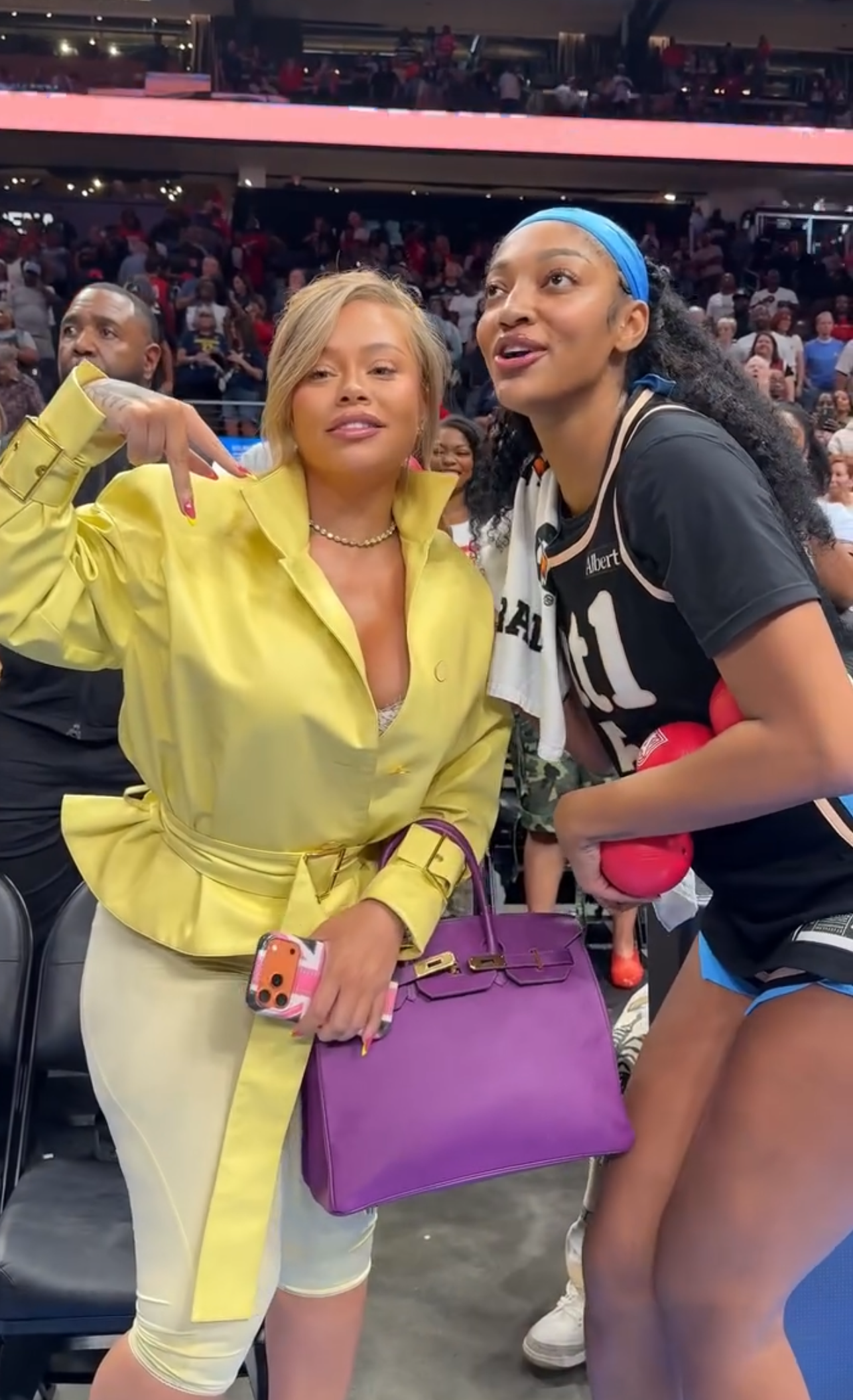 Latto Linked Up With Angel Reese Post-Game in Atlanta Wearing a Lemon ...